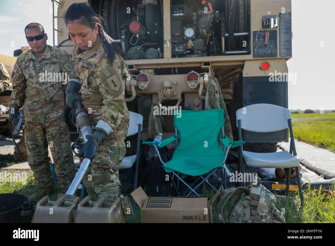 U.S. Army Staff Sgt. Henry Hioe (Left) and Pfc. Yen Ngo (Right ...