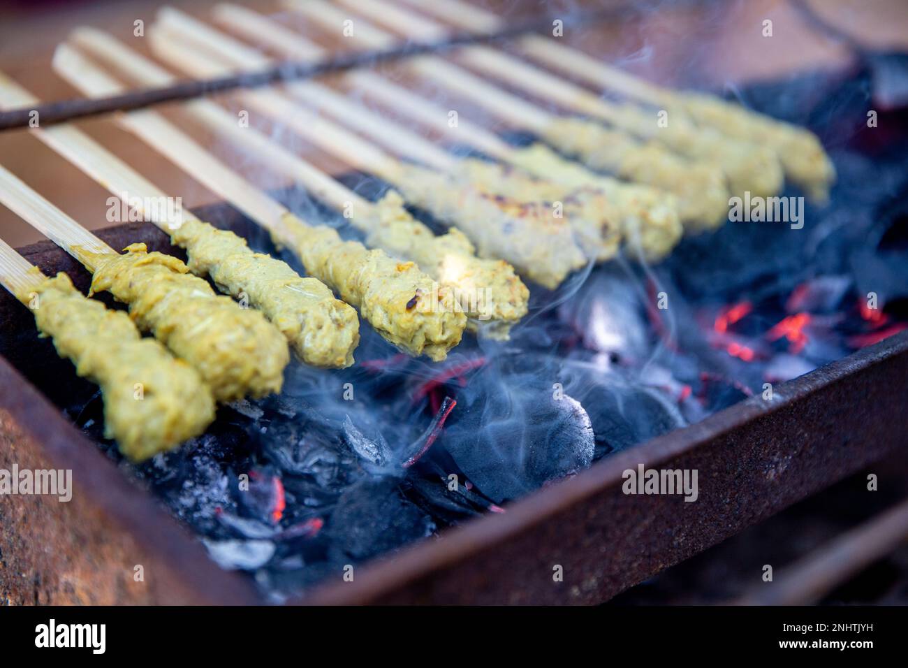 Balinese satay on the grill Stock Photo - Alamy