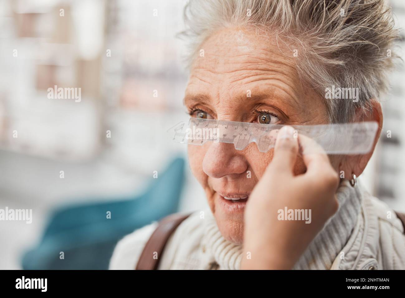 Optometry, ruler and doctor measuring eyes of a woman for glasses ...