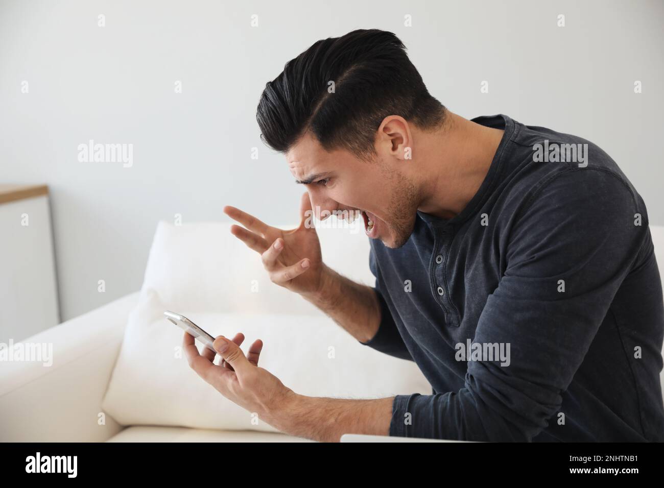 Emotional man shouting in hi-res stock photography and images - Alamy