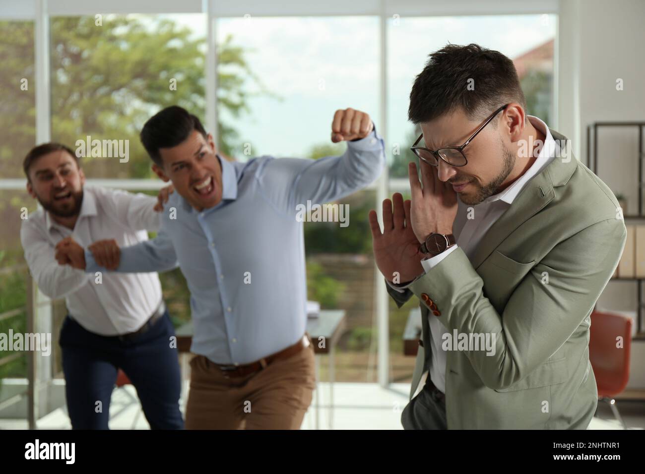 Colleagues arguing workplace disagree hi-res stock photography and ...