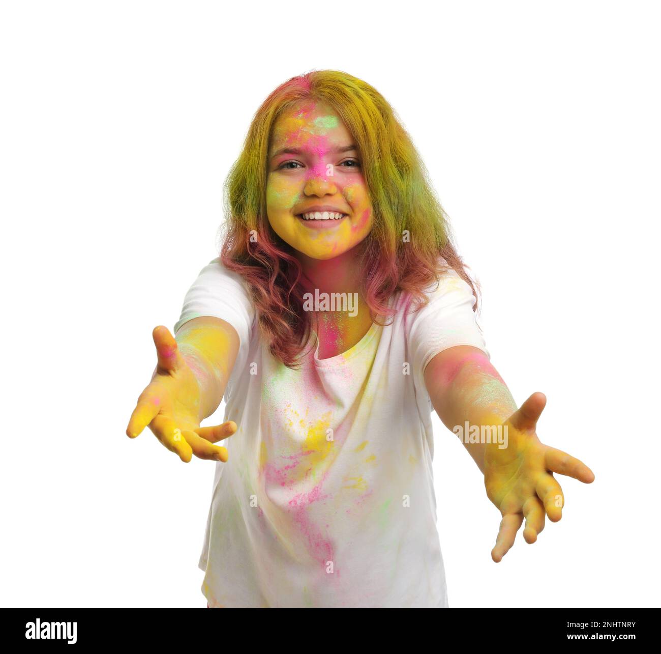 Teen girl covered with colorful powder dyes on white background. Holi ...