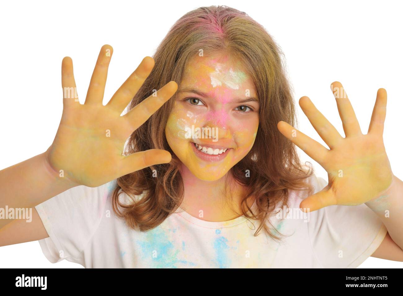 Teen girl covered with colorful powder dyes on white background. Holi ...