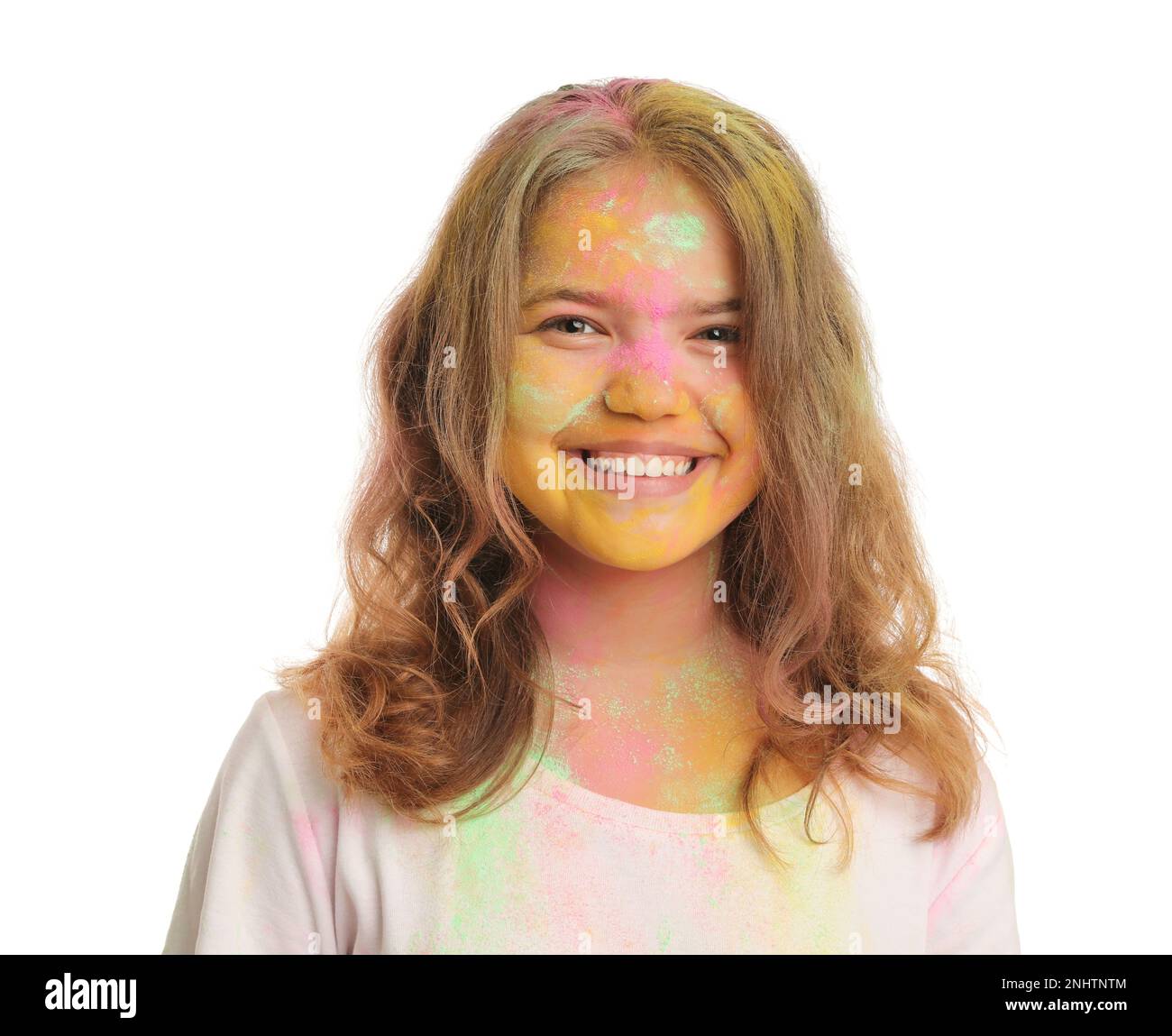 Teen girl covered with colorful powder dyes on white background. Holi ...