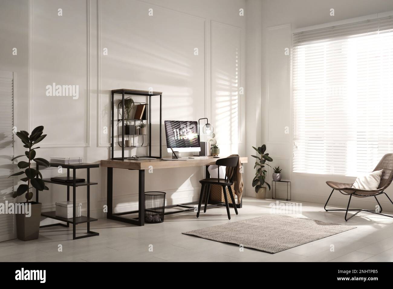 Room interior with comfortable workplace. Modern computer on wooden ...