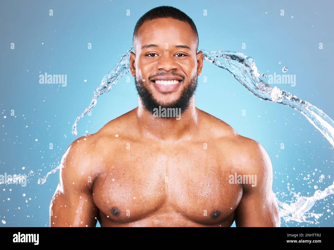 Muscle, strong and water splash for black man cleaning, hygiene and ...