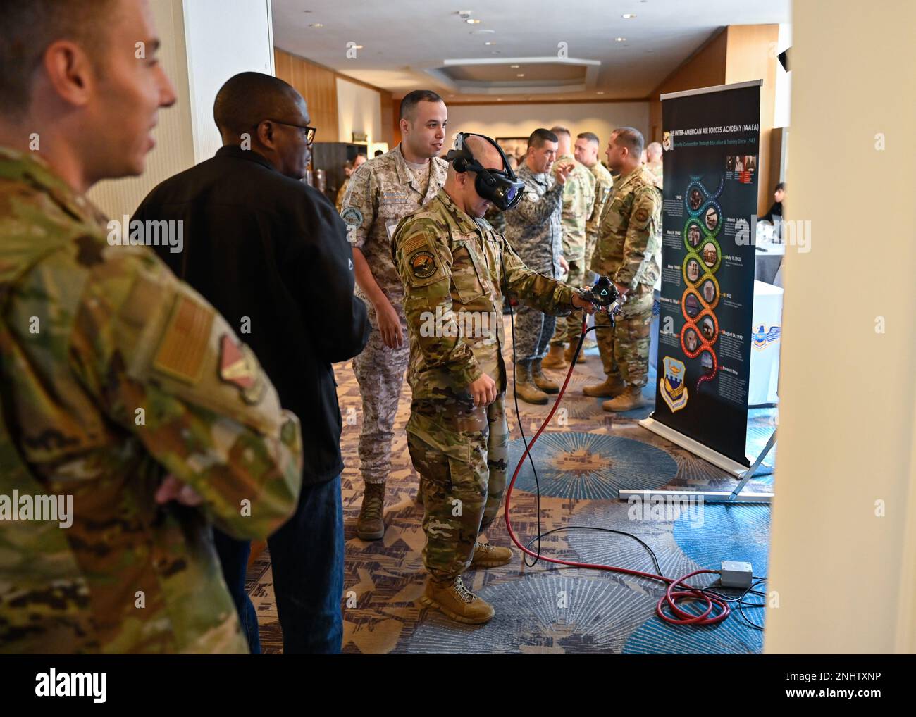 Attendees watch a virtual reality exhibit during the Senior Enlisted ...