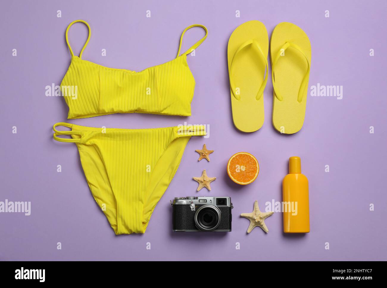 Flat lay composition with beach objects on violet background Stock ...