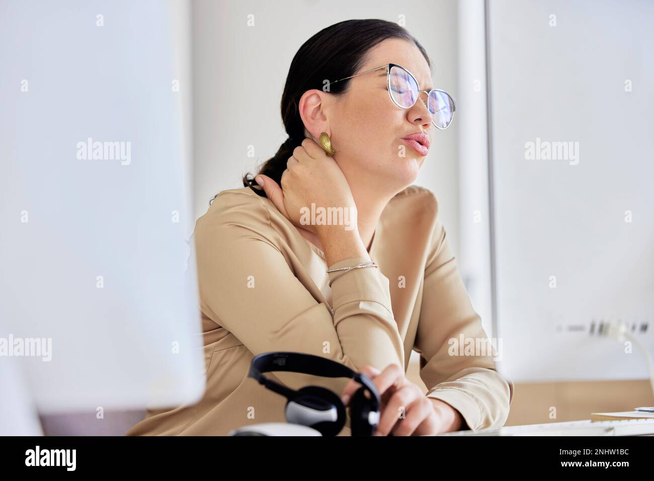Neck pain, call center and woman with stress in customer service ...