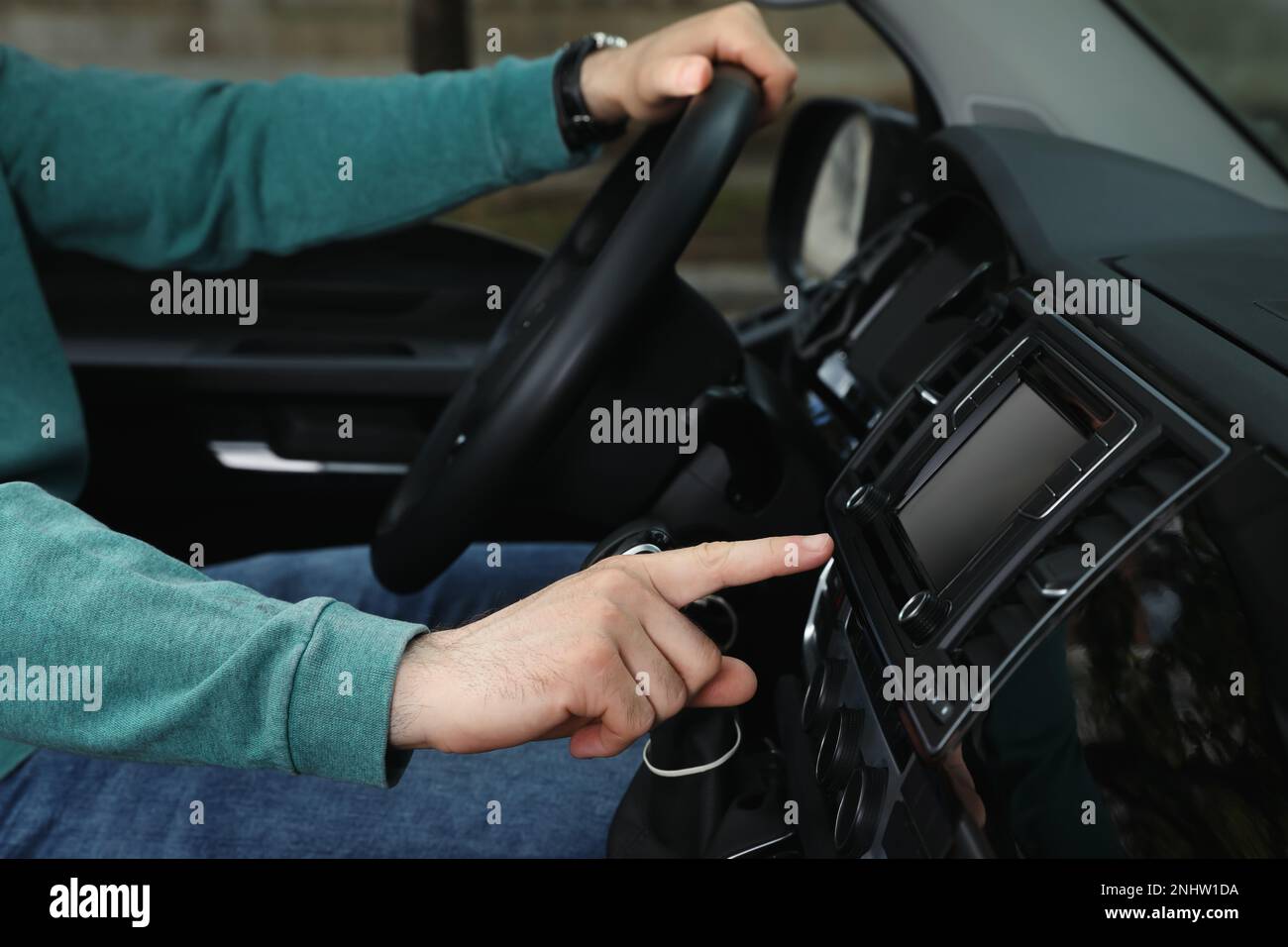 Driver using modern car navigation system, closeup Stock Photo - Alamy