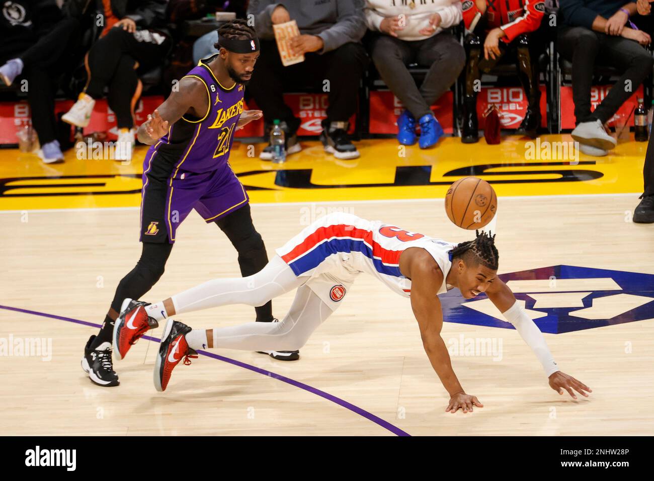Detroit Pistons guard Jaden Ivey (23) is fouled by Los Angeles Lakers ...