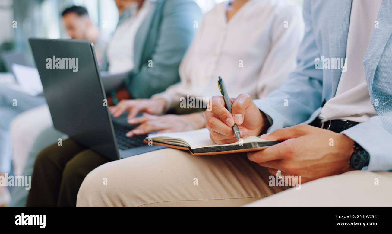 Recruitment, row and business people writing in notebook for hiring ...