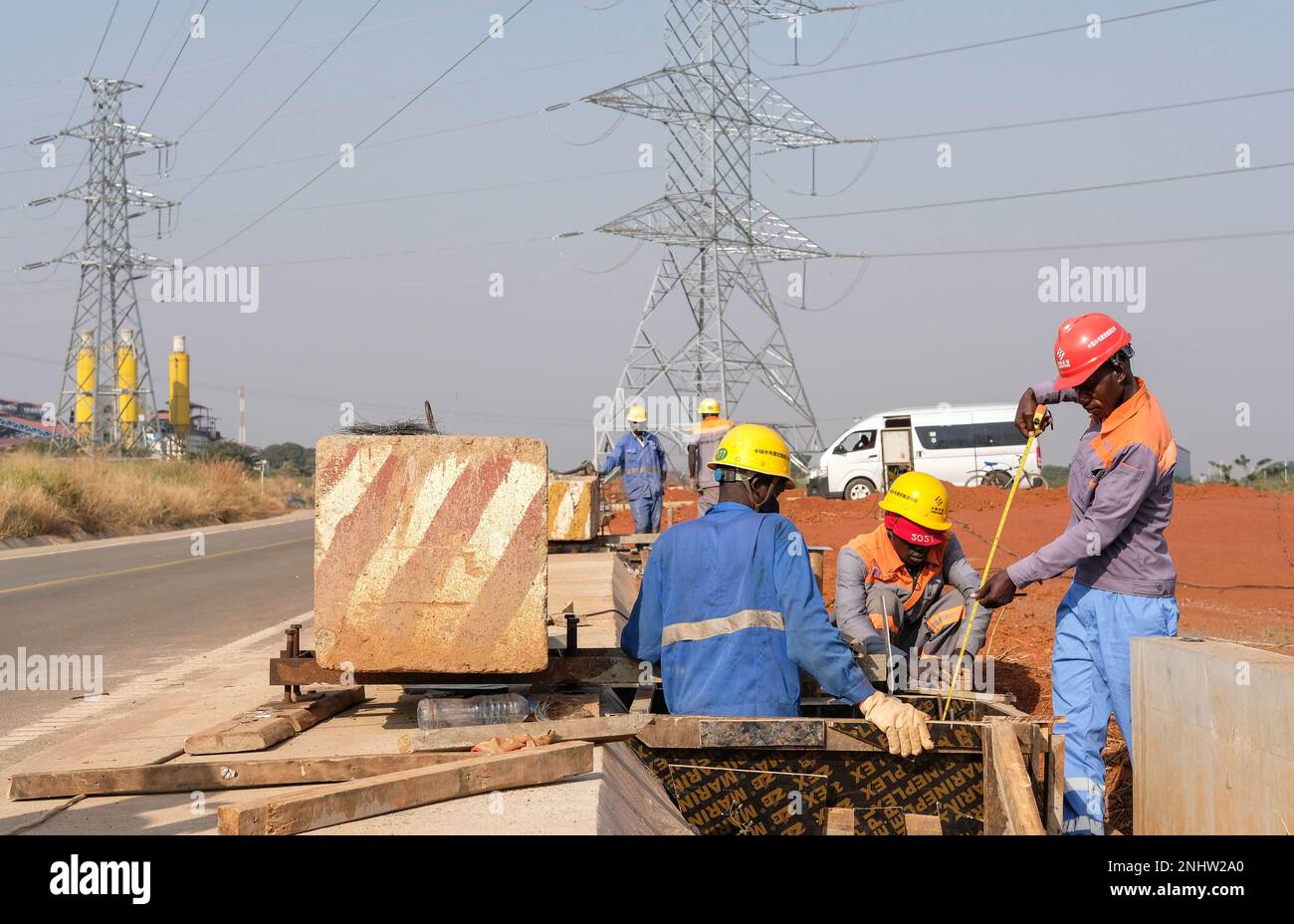 Kiryandongo, Uganda. 5th Feb, 2023. Solomon Acaye (R), who leads a ...