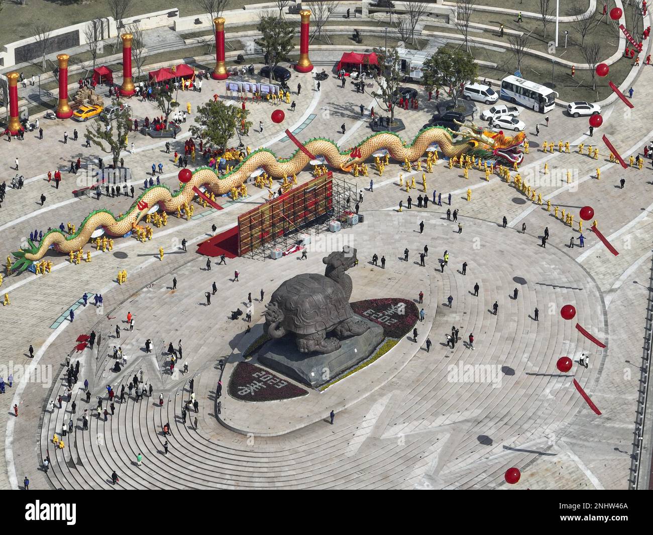 People participate in a parade carrying an 88-meter-long dragon for ...
