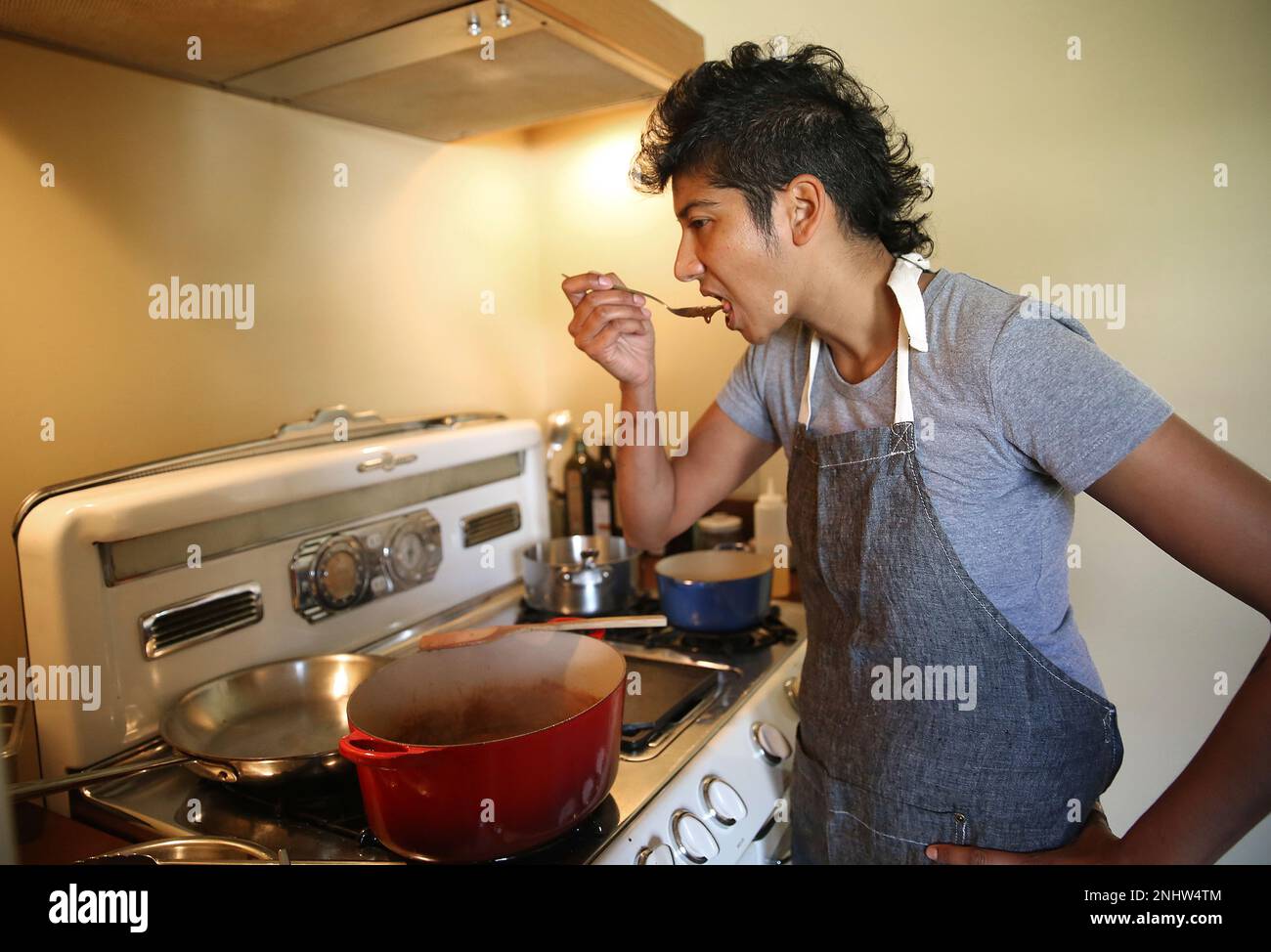 Juhu Beach Club chef Preeti Mistry tastes the sauce for her lamb ...