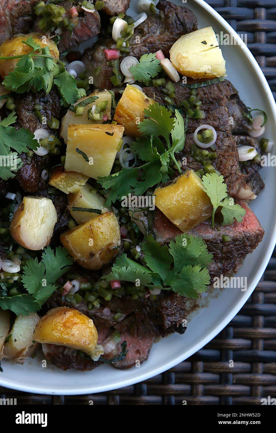 Chef Louis Maldonado of Spoonbar made grilled rib-eye and potato "hobo ...