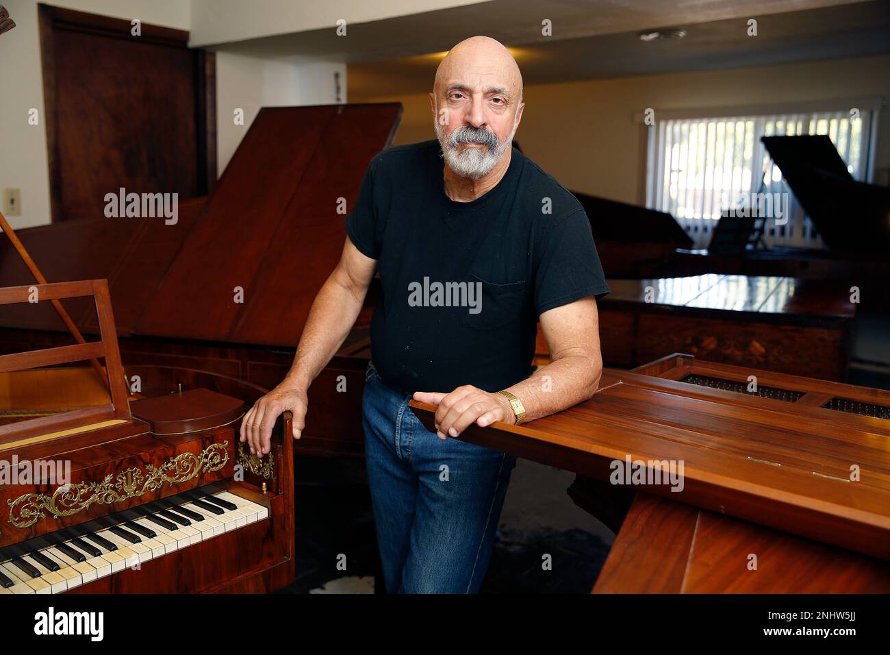 Keyboard performer John Khouri shows his early keyboard instruments in ...