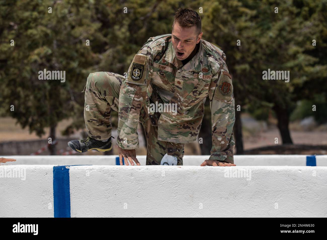 Air Force Reserve Maj. James Fink, 94th Aerial Port Squadron, vaults ...