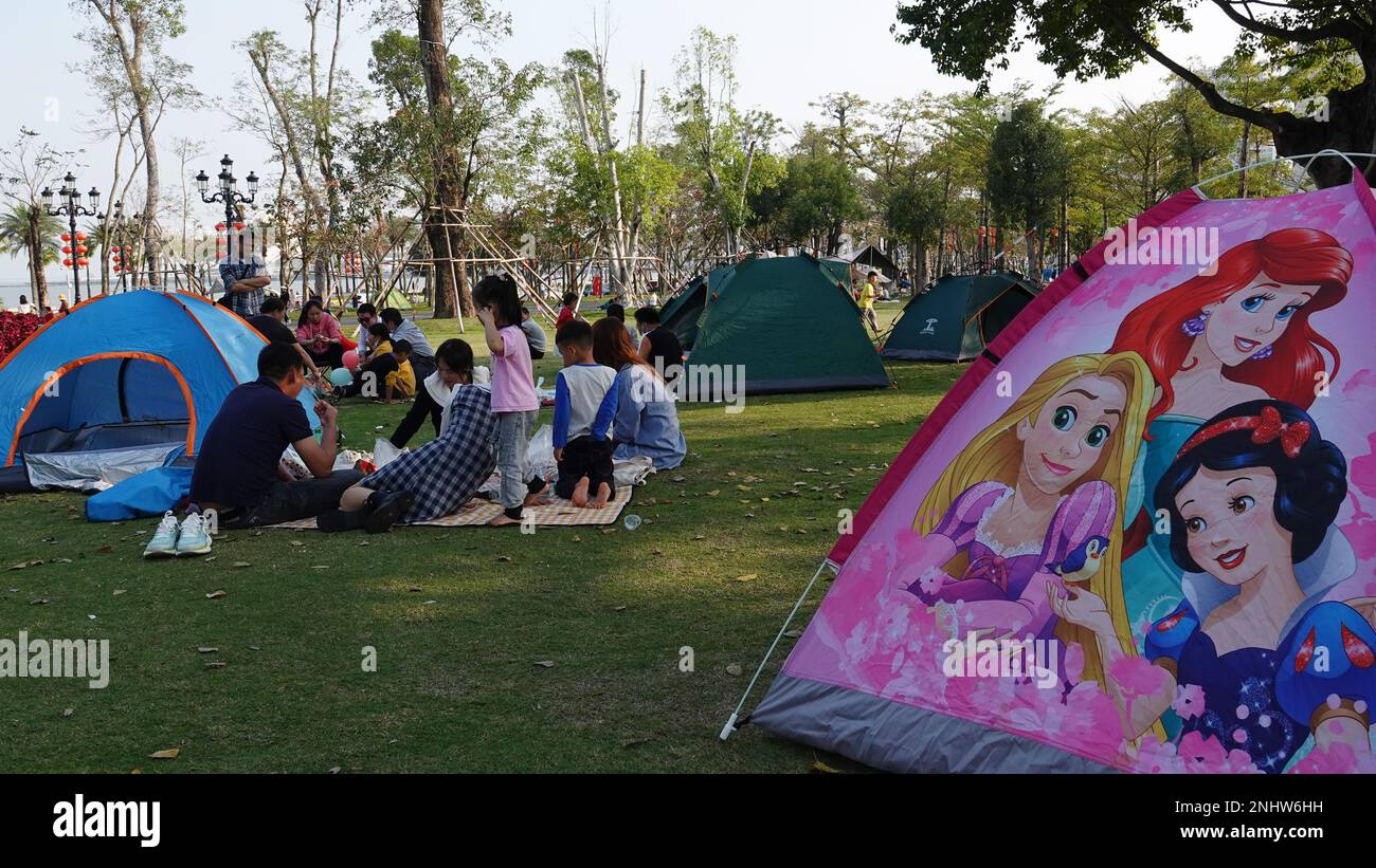 People enjoy camping in Haitian Park in Zhuhai City, south China's ...