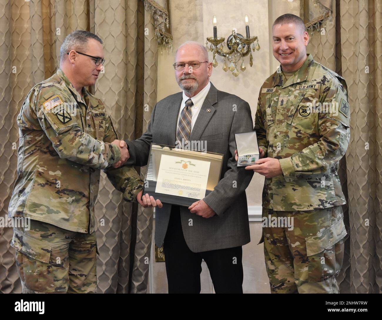 Evan Brown, Cadet Command, receives the 2022 Category III Civilian ...