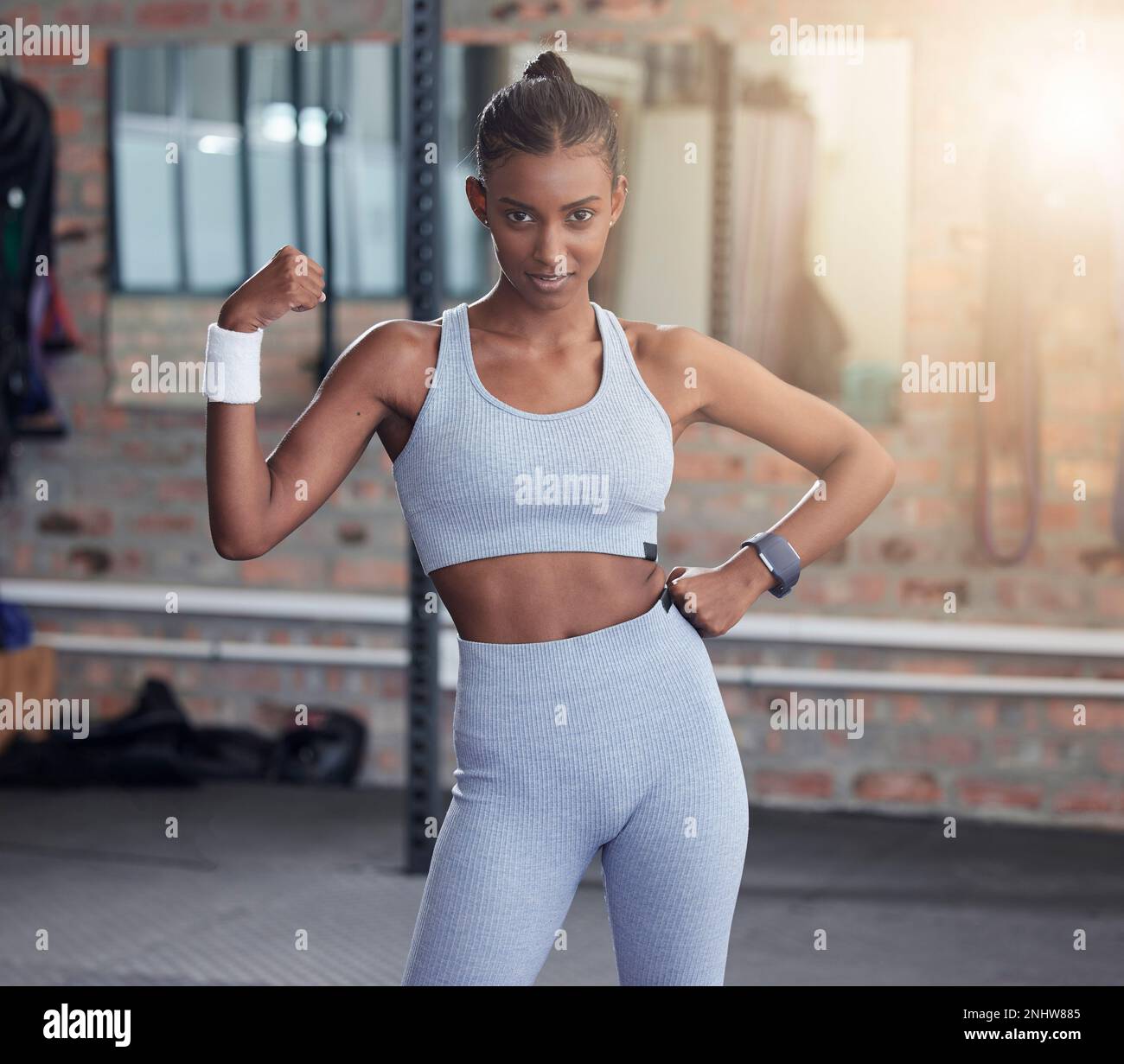 Female bodybuilder showing bicep hi-res stock photography and images ...