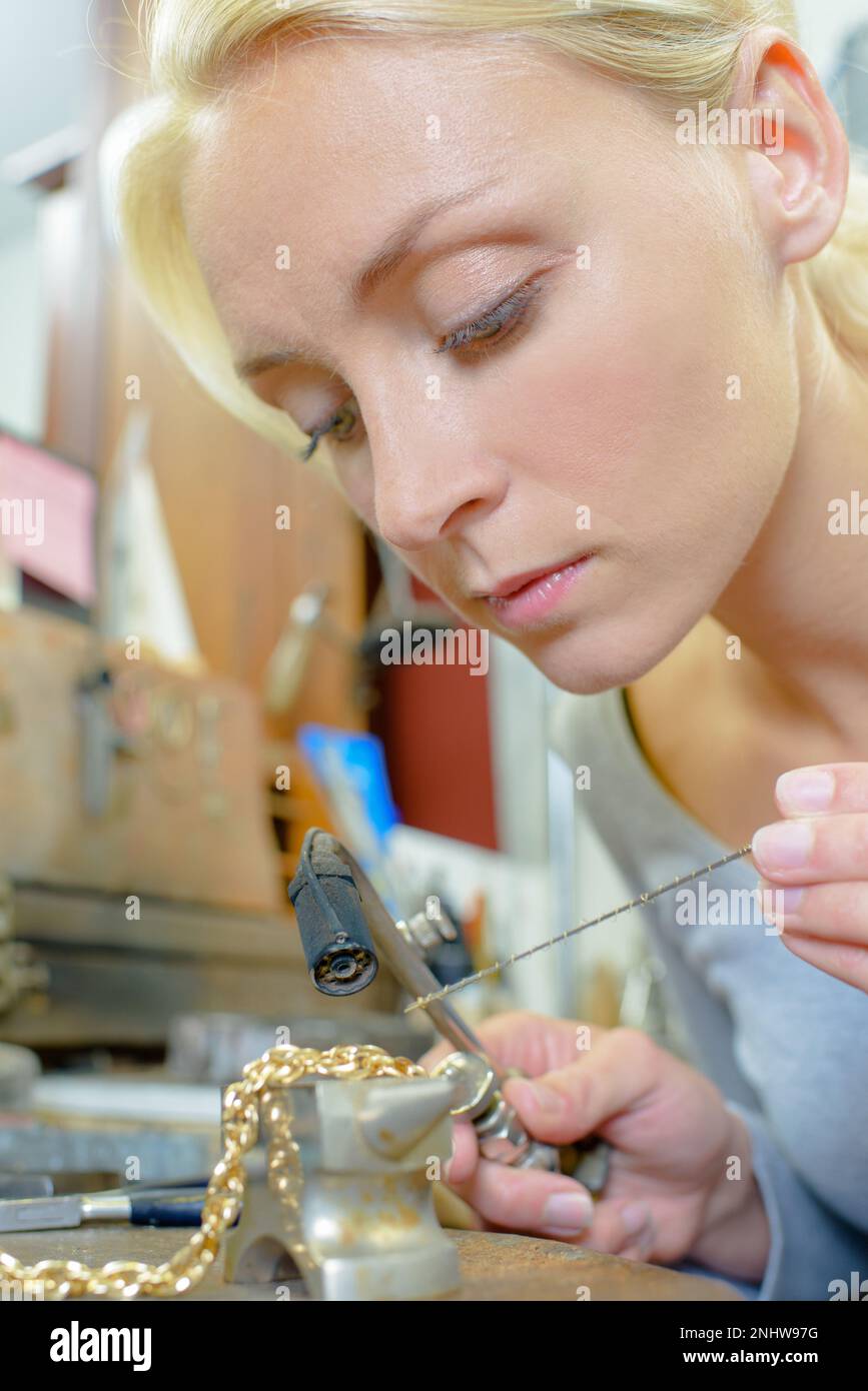 Soldering gold chain hi-res stock photography and images - Alamy