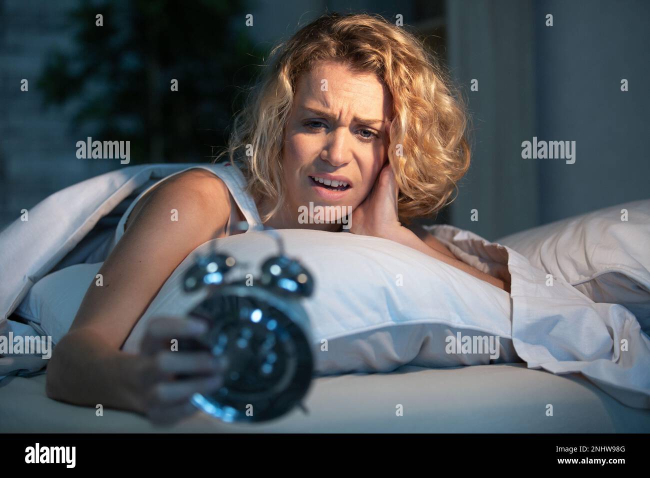 portrait of young woman suffering from insomnia in the bed Stock Photo ...