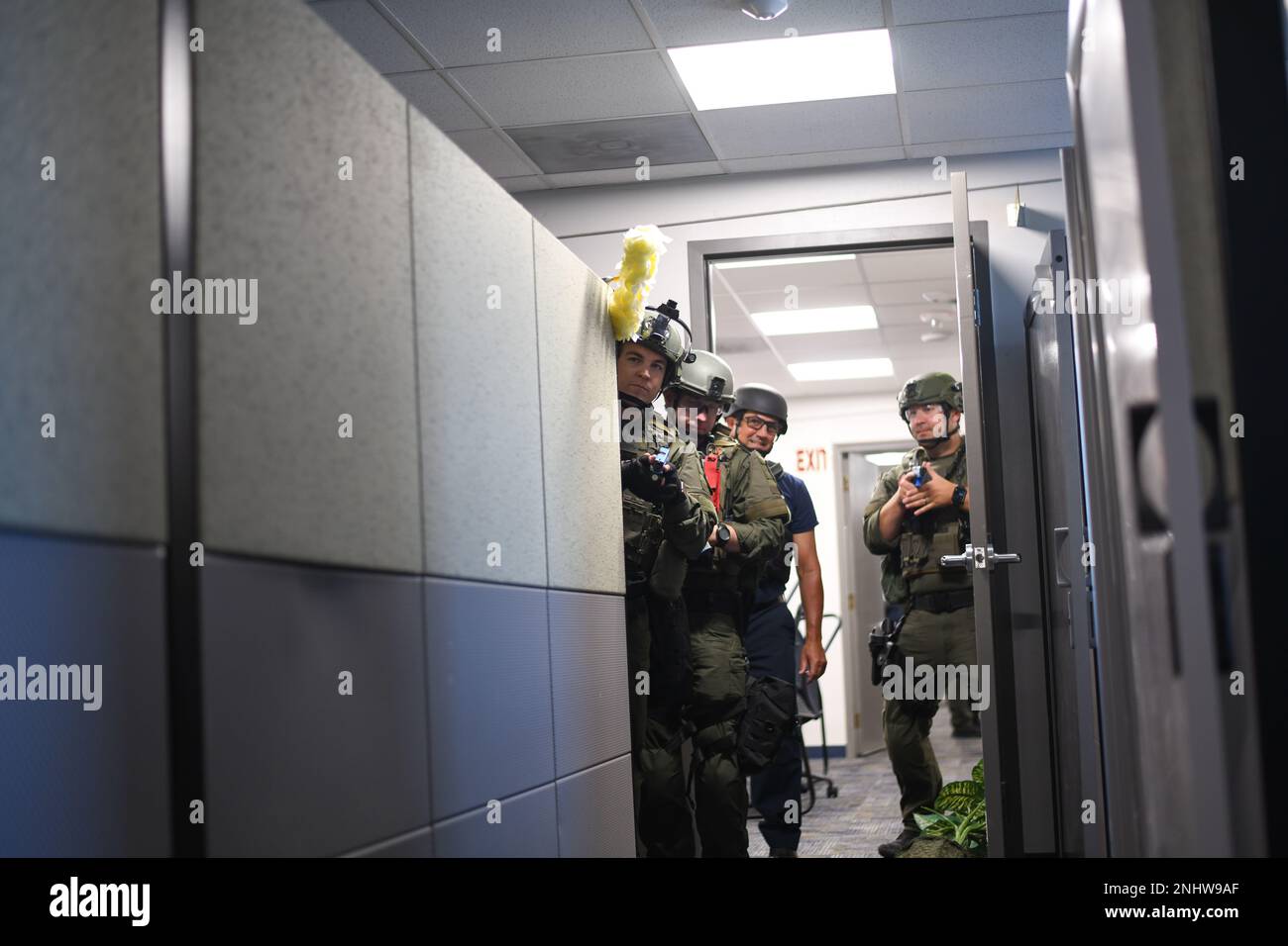 Security conduct a room by room pursuit in search of the active shooter ...