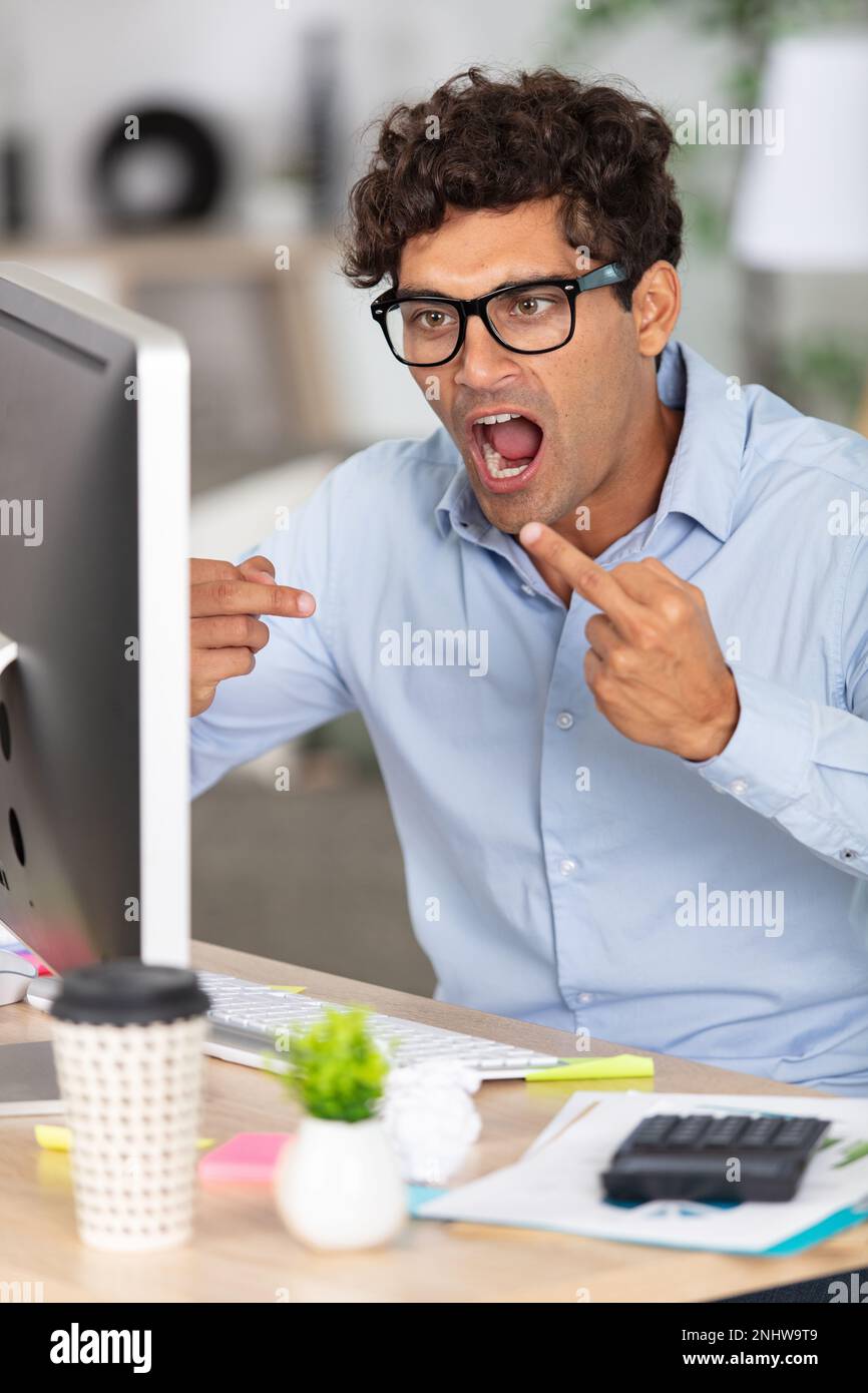 Angry businessman stack papers hi-res stock photography and images - Alamy