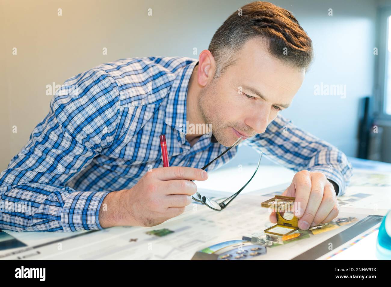 Printing industry magnifying glass hi-res stock photography and images ...