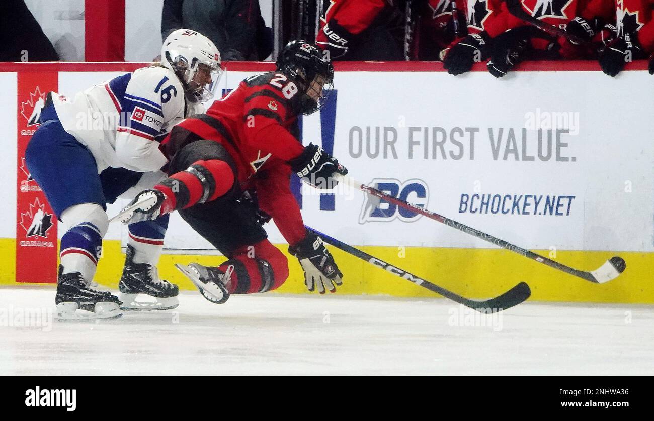 United States' Hayley Scamurra (16) trips Canada's Micah Zandee-Hart ...