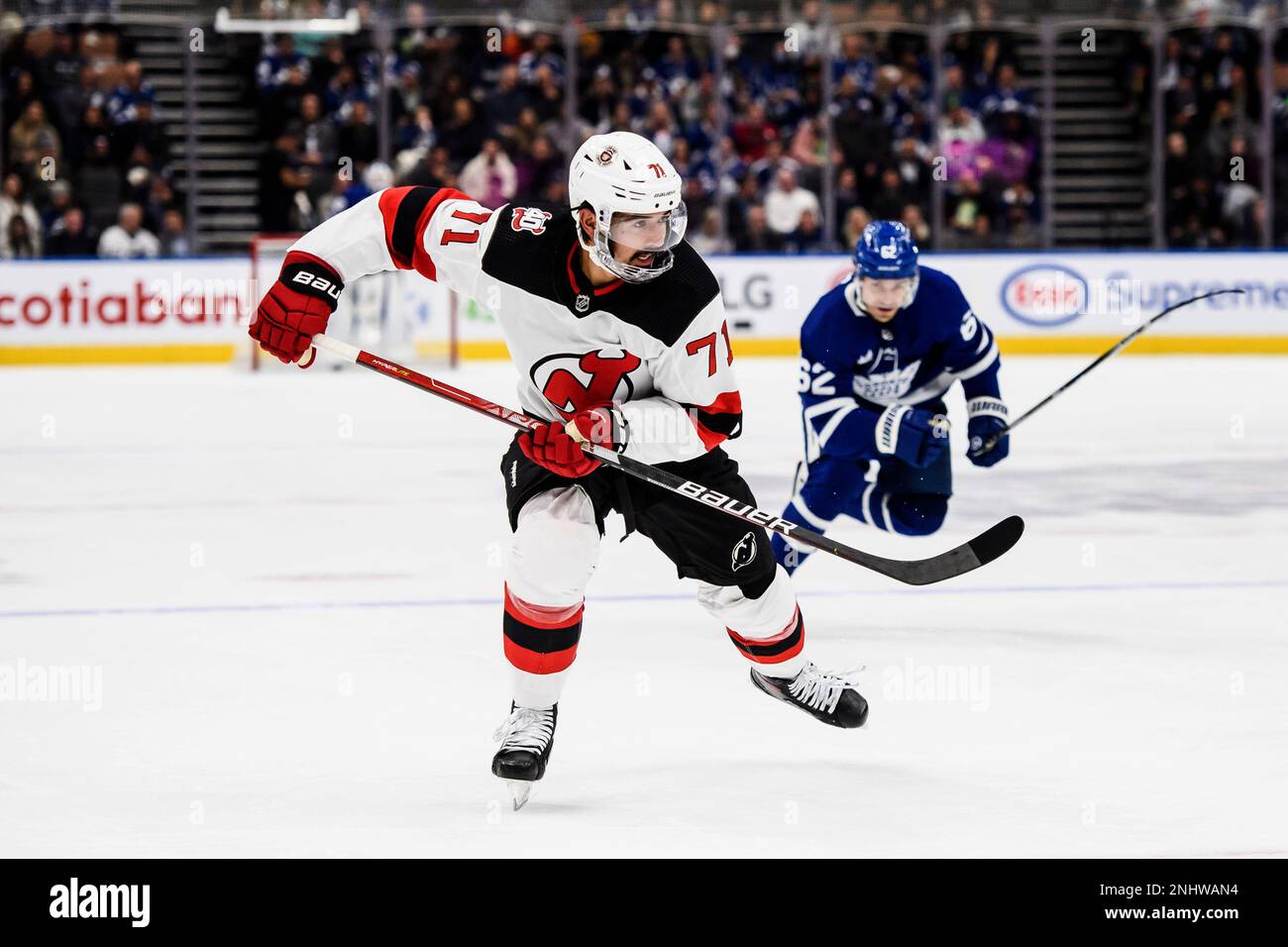 New Jersey Devils defenseman Jonas Siegenthaler (71) is pursued by ...