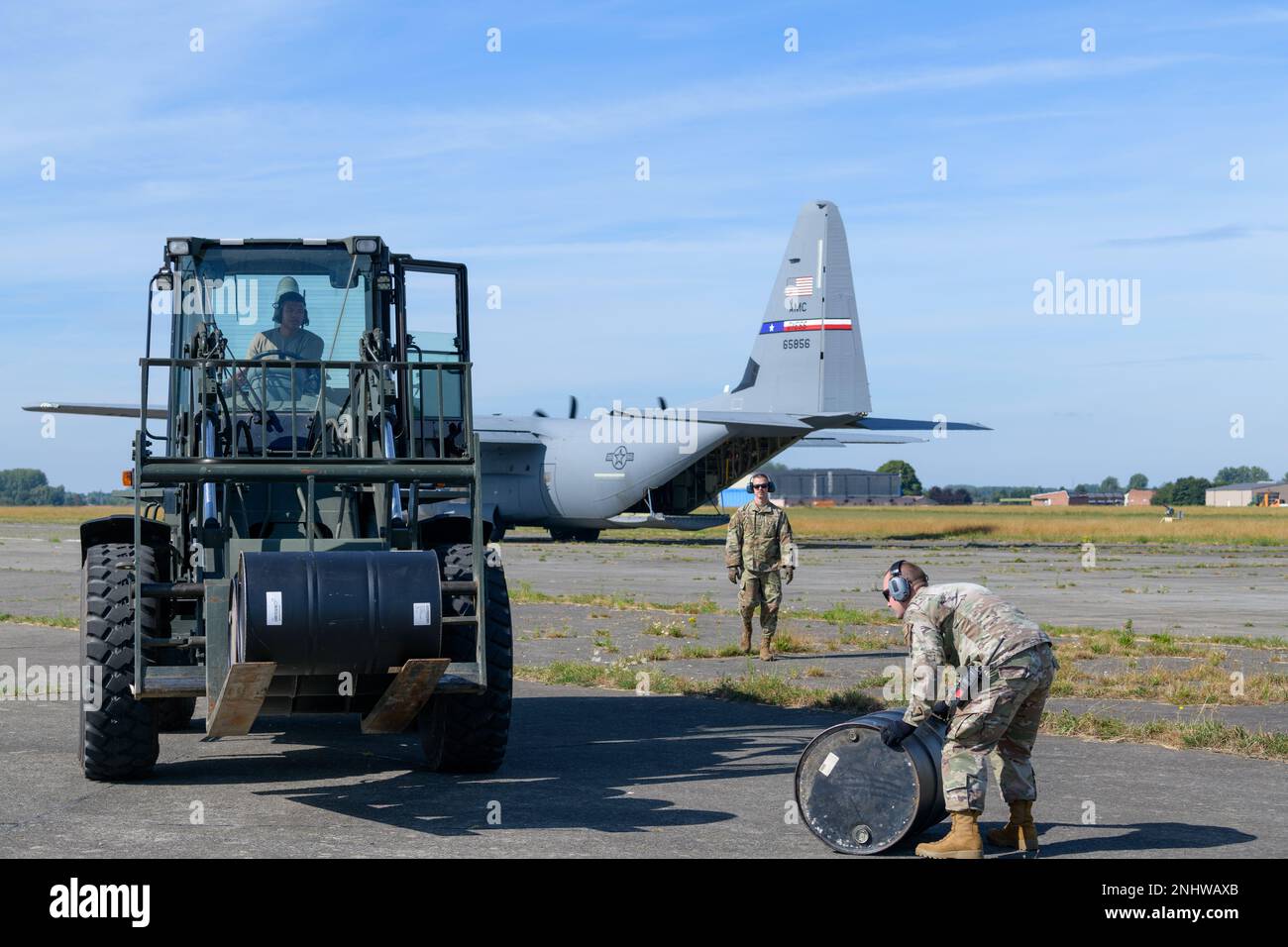 U.S. Airmen assigned to the 424th Air Base Squadron retrieve the ...