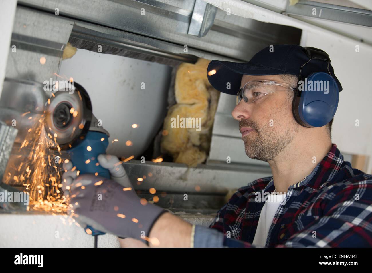 welder grinder metal an angle grinder Stock Photo - Alamy