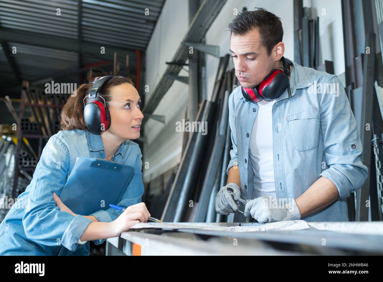 factory of construction materials workers Stock Photo - Alamy