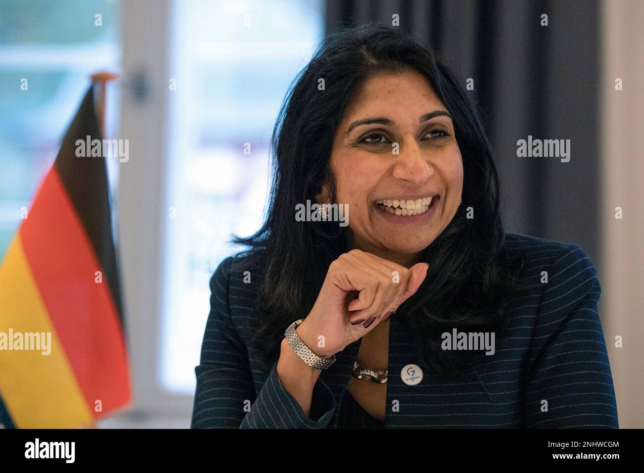 Britain's Home Secretary Suella Braverman sits in a bilateral meeting ...
