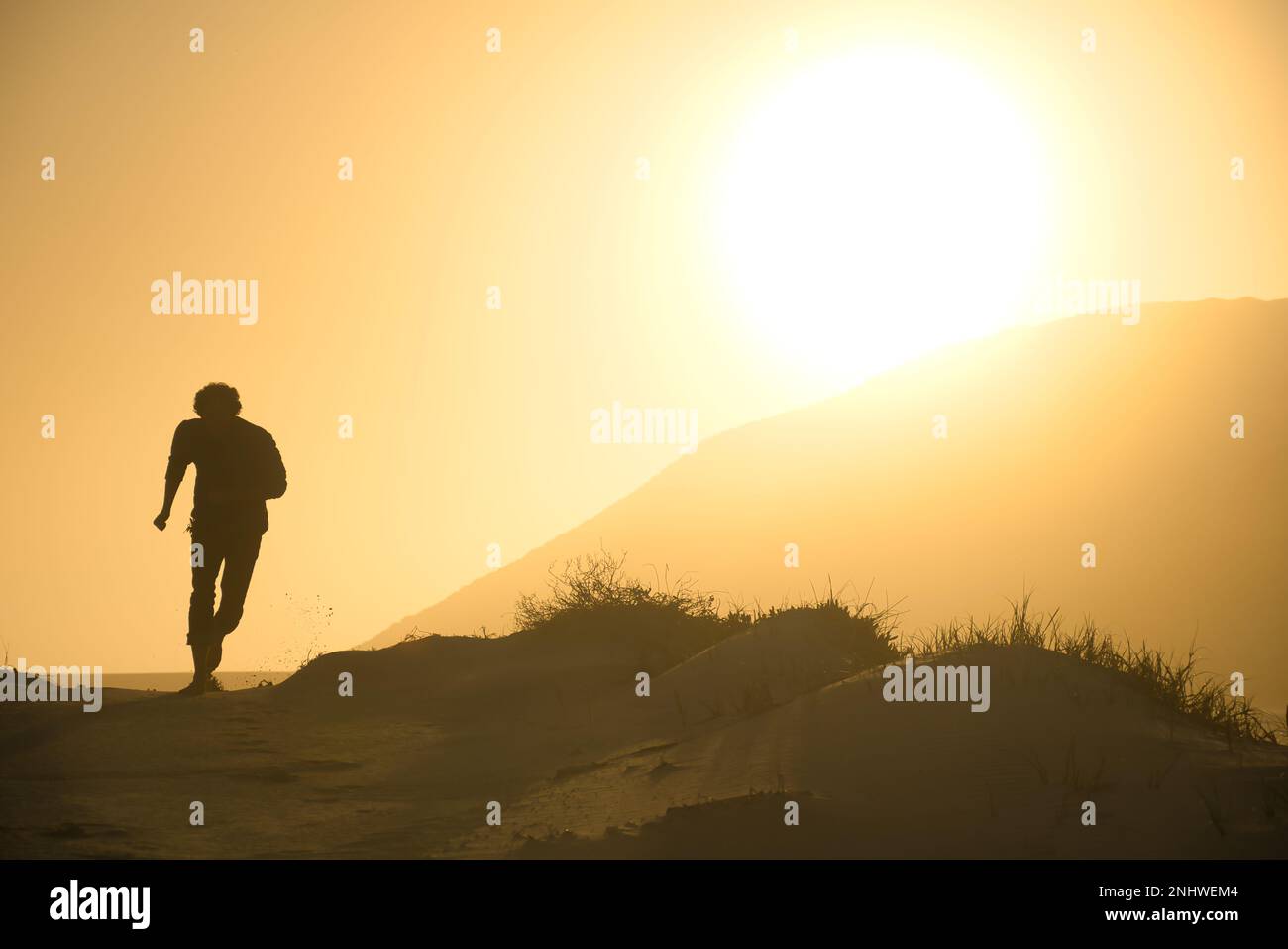 Man running in silhouette hi-res stock photography and images - Alamy