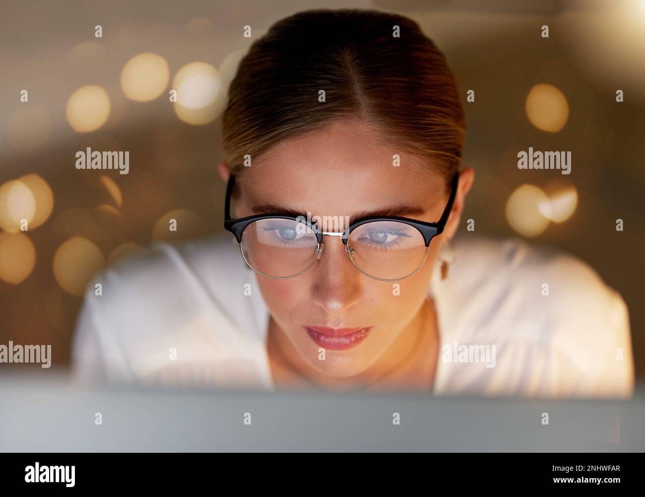 Business woman, face and reading on computer, focus and working, editor ...