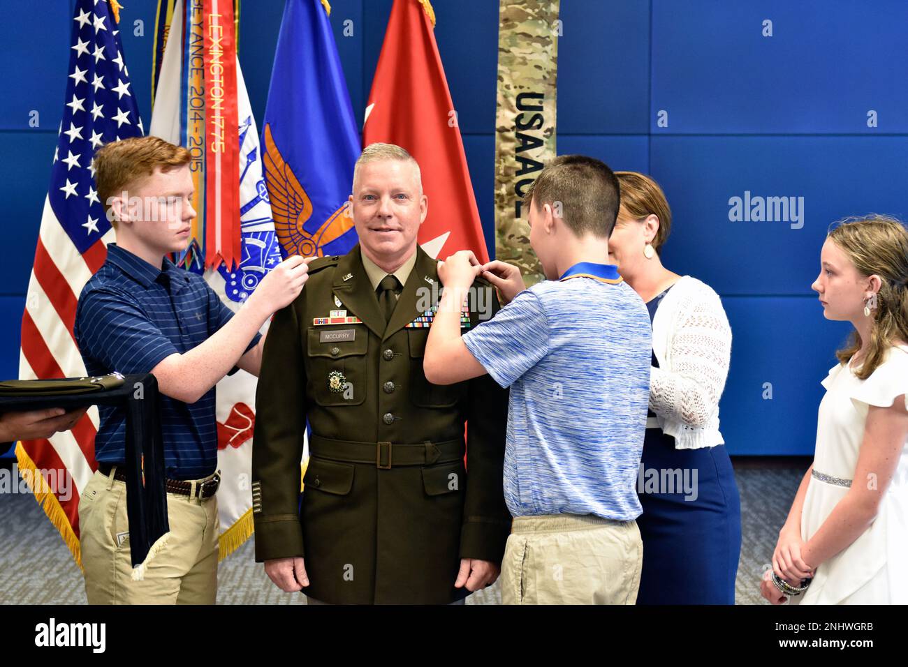 Maj. Gen. Michael C. McCurry's family pins on a second star during his ... Maj. Gen. Michael C. McCurry's family pins on a second star during his ...