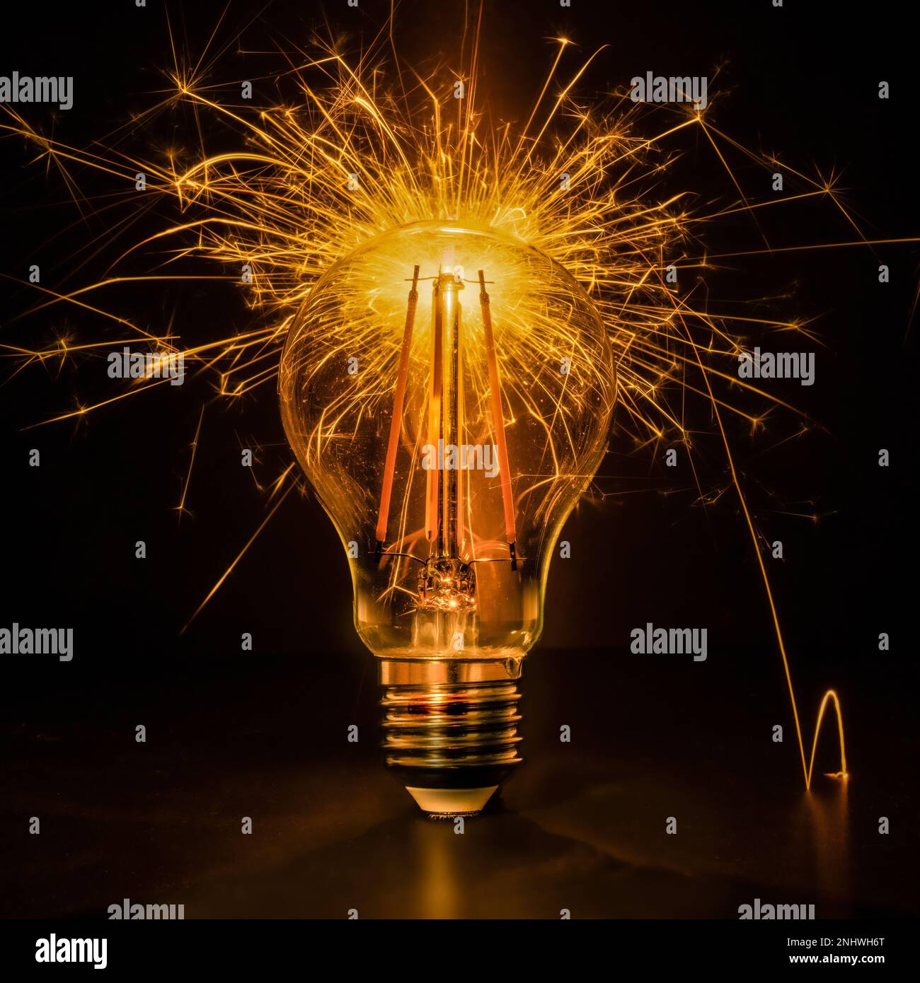 Long exposure lightbulb with sparkler Stock Photo - Alamy