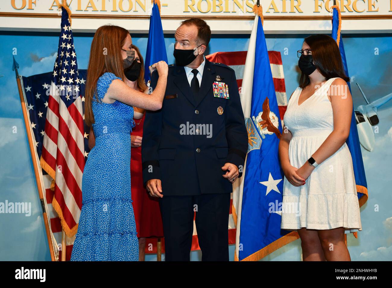Lt. Gen. John Healy’s daughter pins his new rank on his uniform during ...