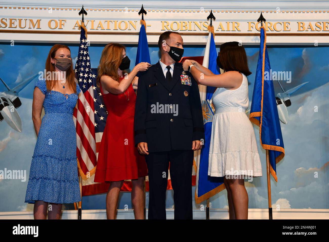 Lt. Gen. John Healy’s family pin his new rank on his uniform during his ...