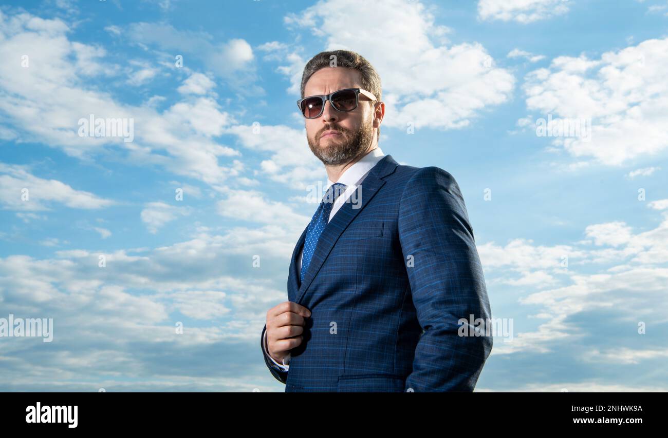 male ceo in business suit. photo of ceo in suit. ceo in suit on sky ...