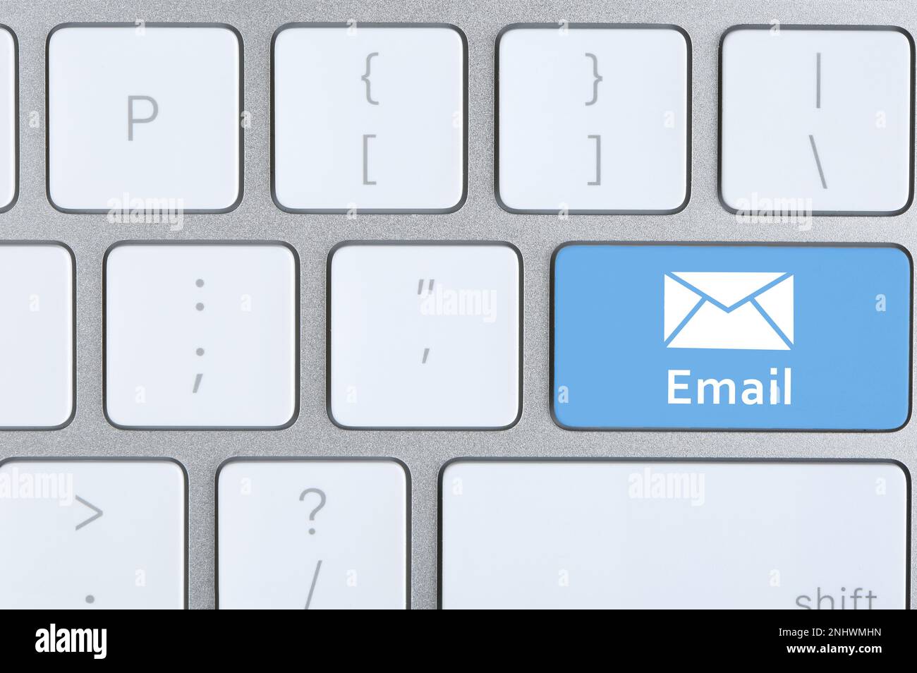 Modern computer keyboard with envelope sign on button, top view ...