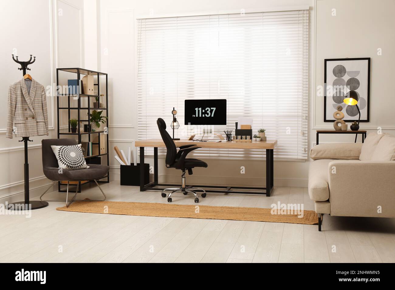 Home office interior with comfortable workplace near window Stock Photo ...