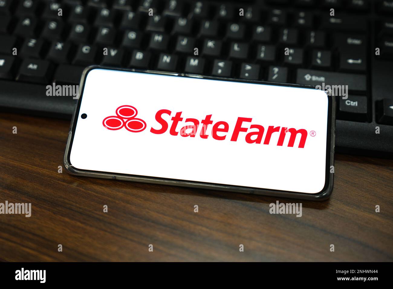 In this photo illustration, a State Farm Insurance Cos logo is ...