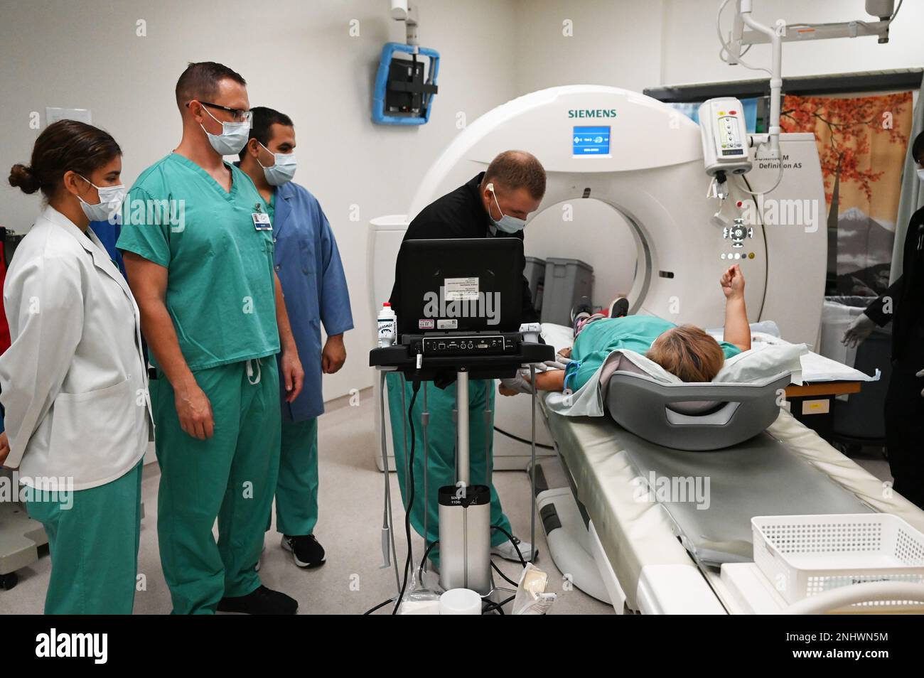 Staff Sgt. Brianna Farrington, medic, Capt. Jamison Meints, nurse and ...