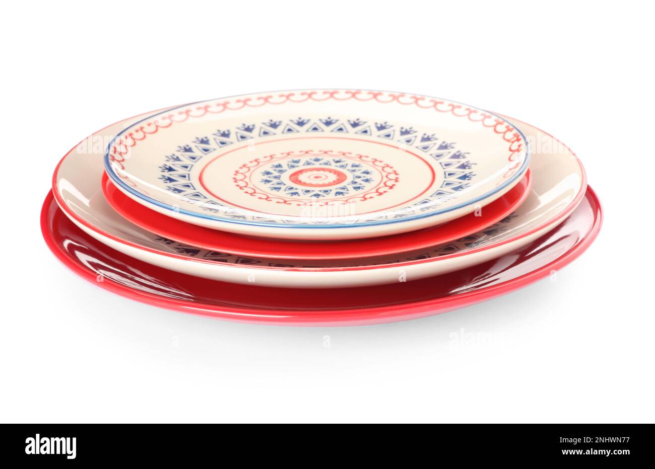 Stack of clean dishes on white background Stock Photo - Alamy