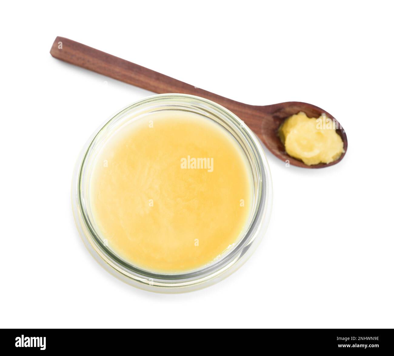 Glass jar and spoon of Ghee butter isolated on white, top view Stock ...
