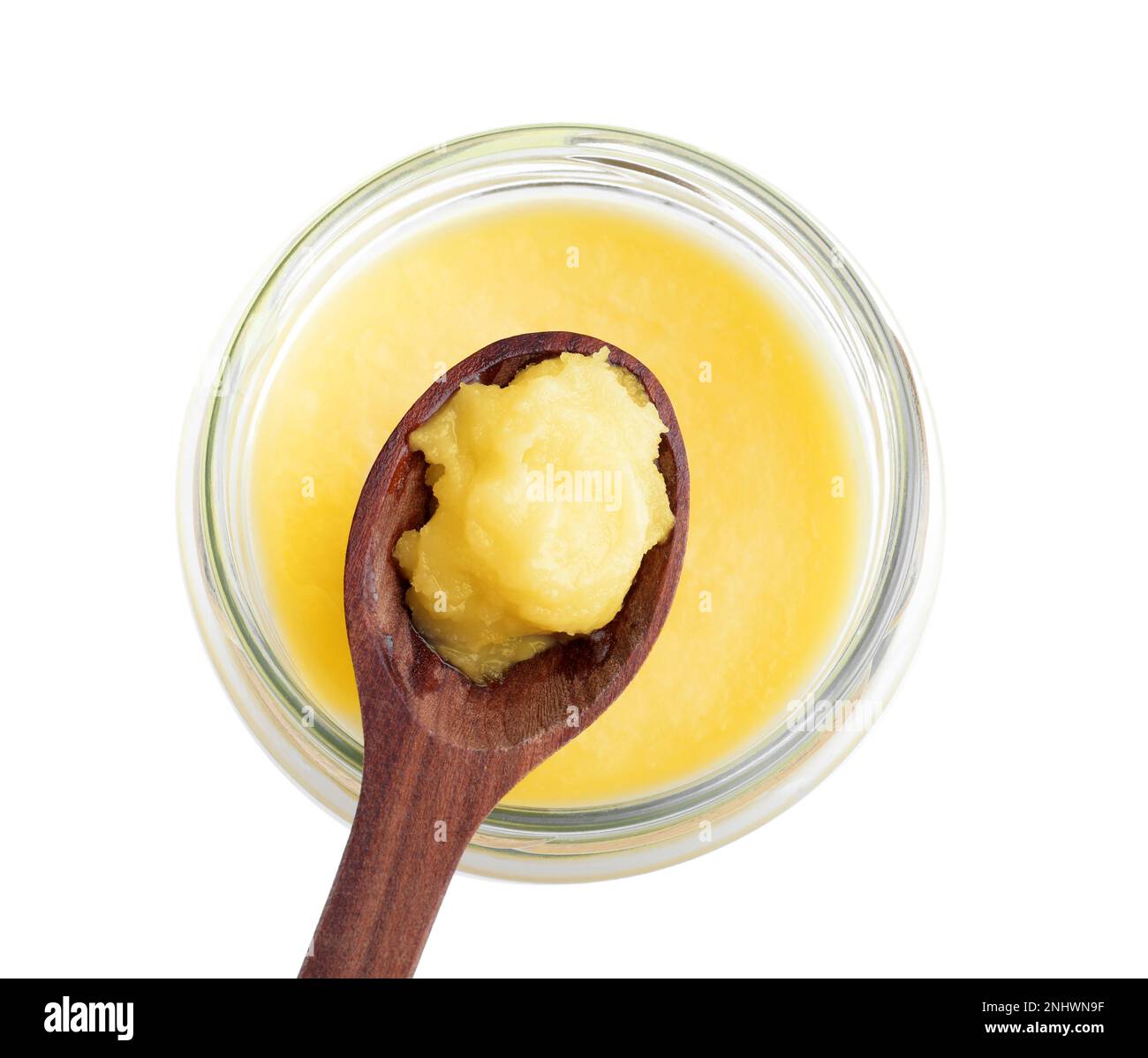 Glass jar and spoon of Ghee butter isolated on white, top view Stock ...